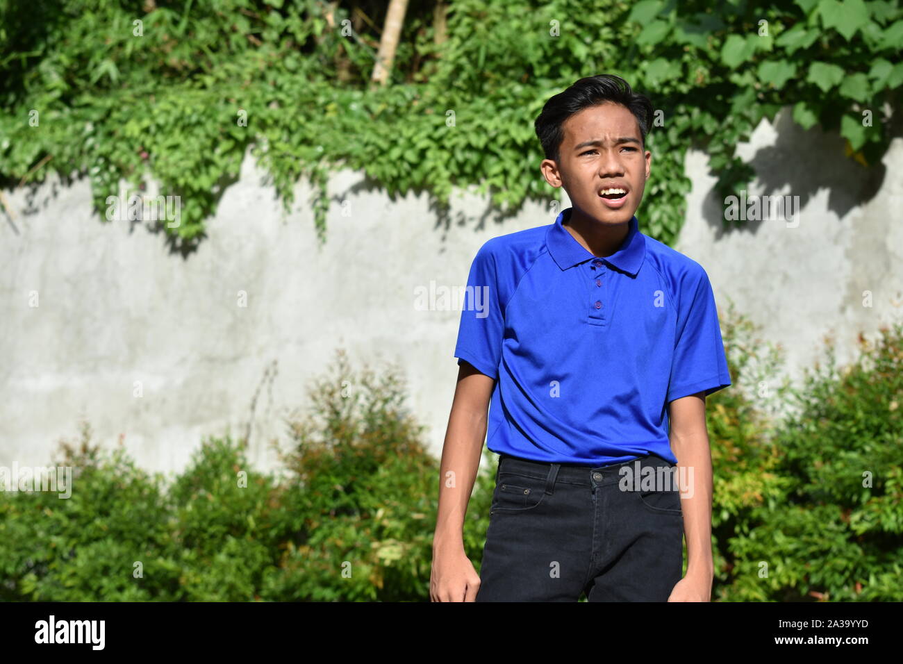 A Boy And Confusion Stock Photo - Alamy