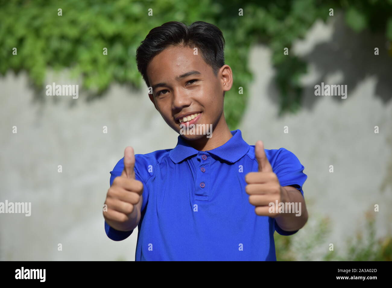 A Filipino Male With Thumbs Up Stock Photo - Alamy