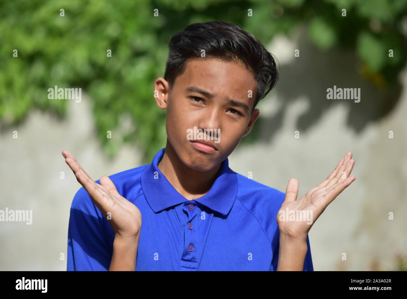 Filipino Teenager Boy Making A Decision Stock Photo - Alamy