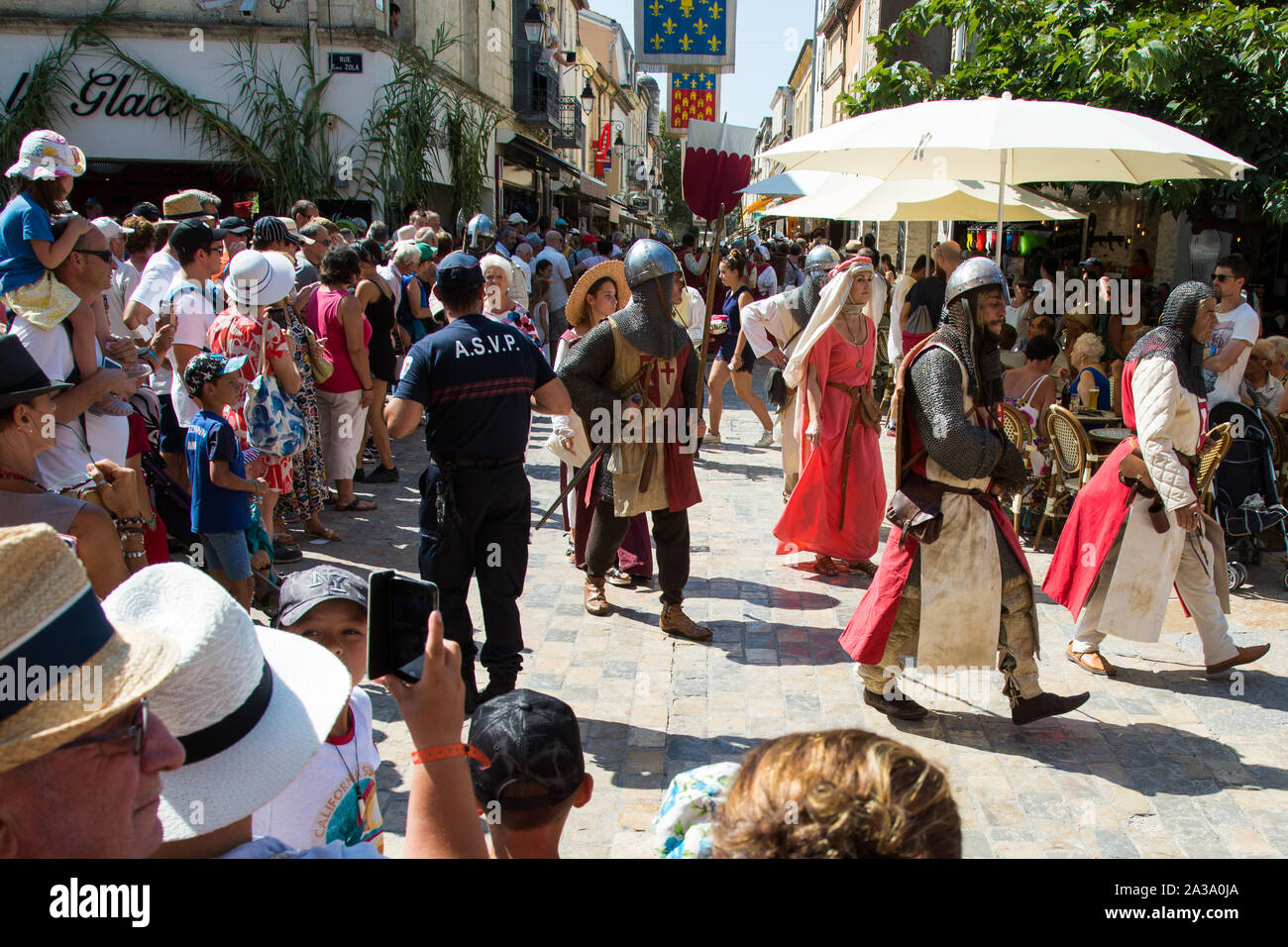 Aigues-Mortes, France. 24 August, 2019. A crowd of people watches a ...