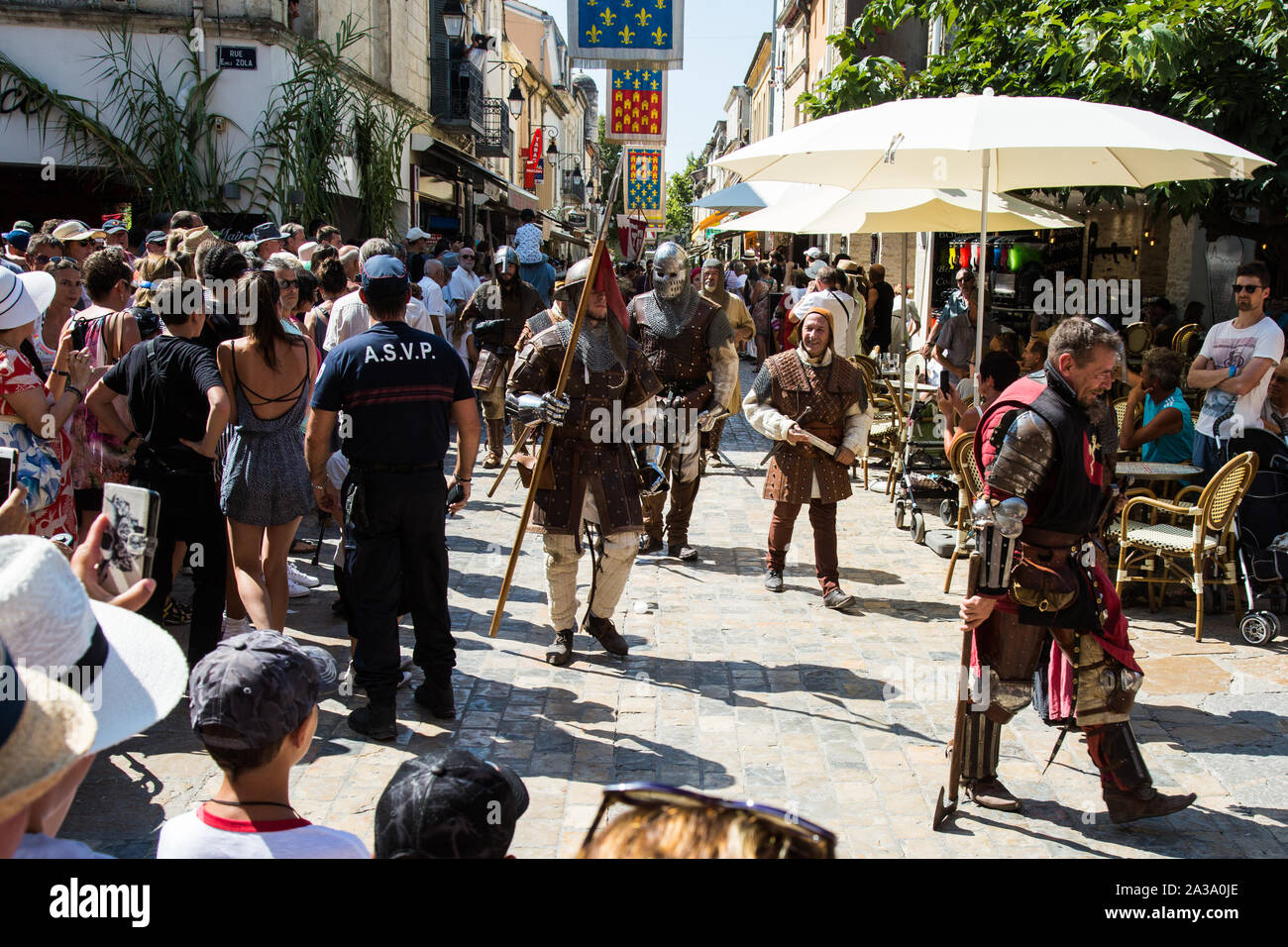 Aigues-Mortes, France. 24 August, 2019. A crowd of people watches a ...