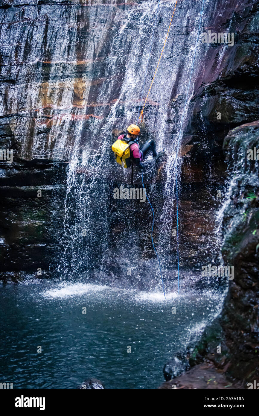 Empress Falls, Blue Mountains, Australia - Sept 7 2019: Man rappelling ...