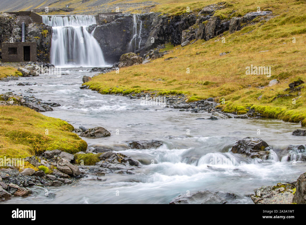 Waterfalls fall over basalt rocks in Iceland Stock Photo - Alamy