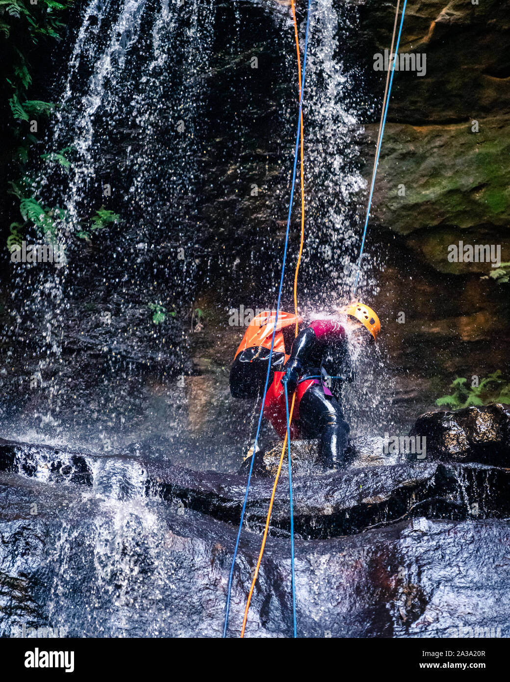 Abseiling rock gloves helmet hi-res stock photography and images - Alamy