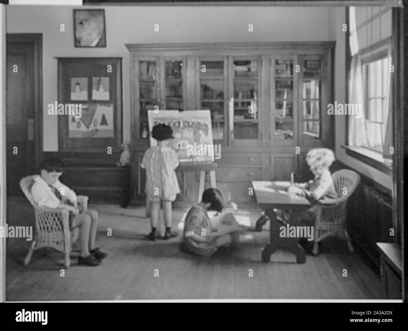 School community evolution Black and White Stock Photos & Images - Alamy