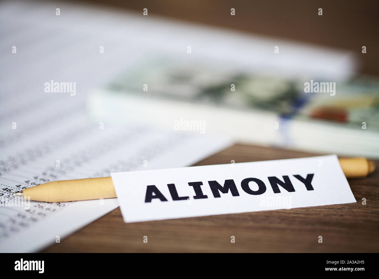 Divorce and separation concept. Alimony written on white card Stock ...
