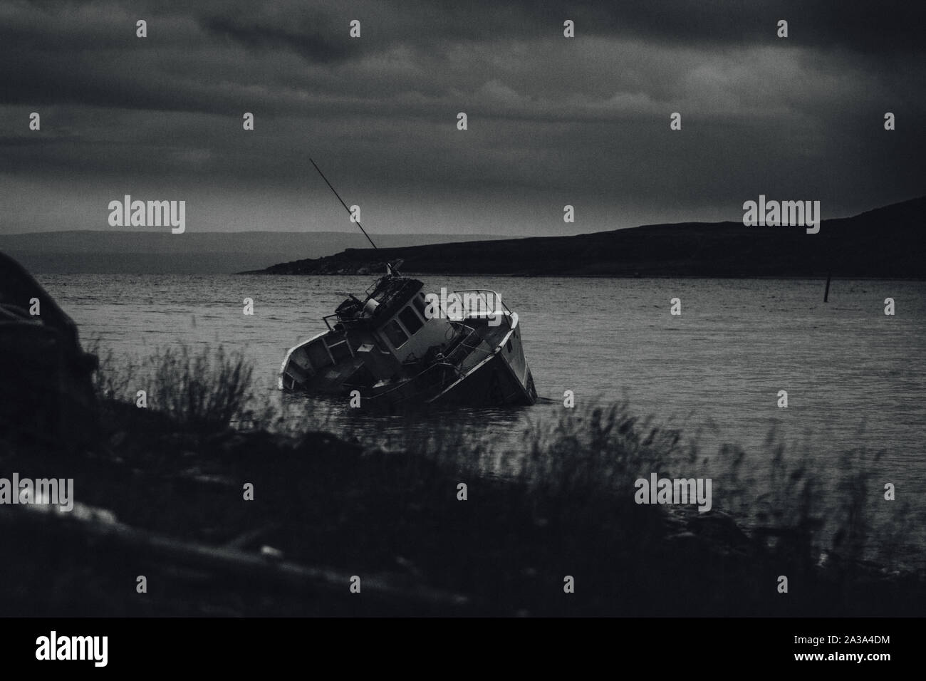 The mysterious feeling of a ship sinking in the cover of night Stock ...