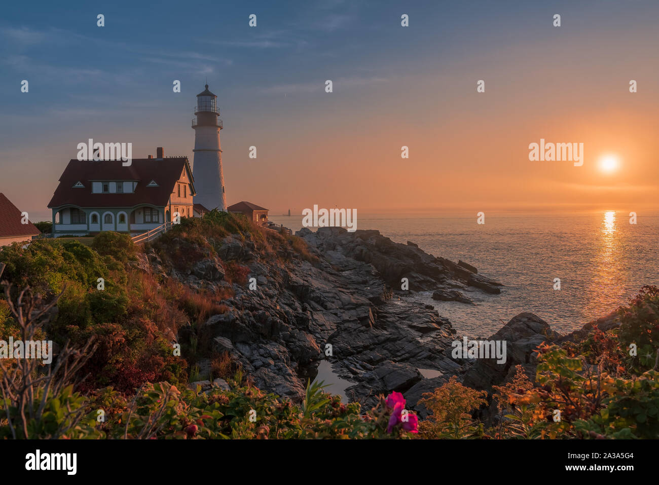 Magical sunrise at the iconic Portland Head Light. Portland, Maine ...