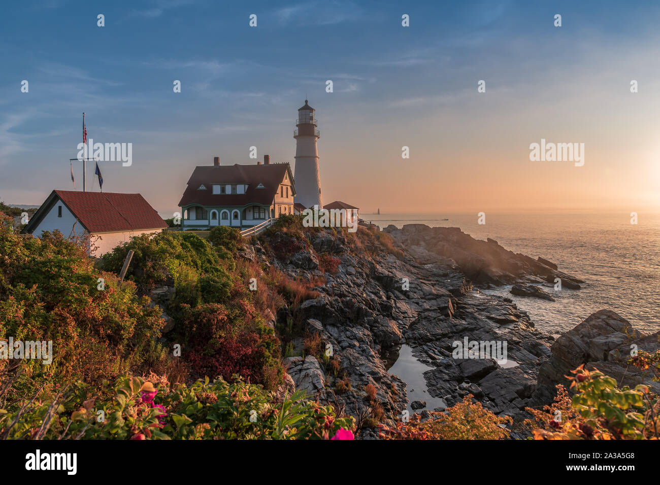 Magical sunrise at the iconic Portland Head Light. Portland, Maine ...