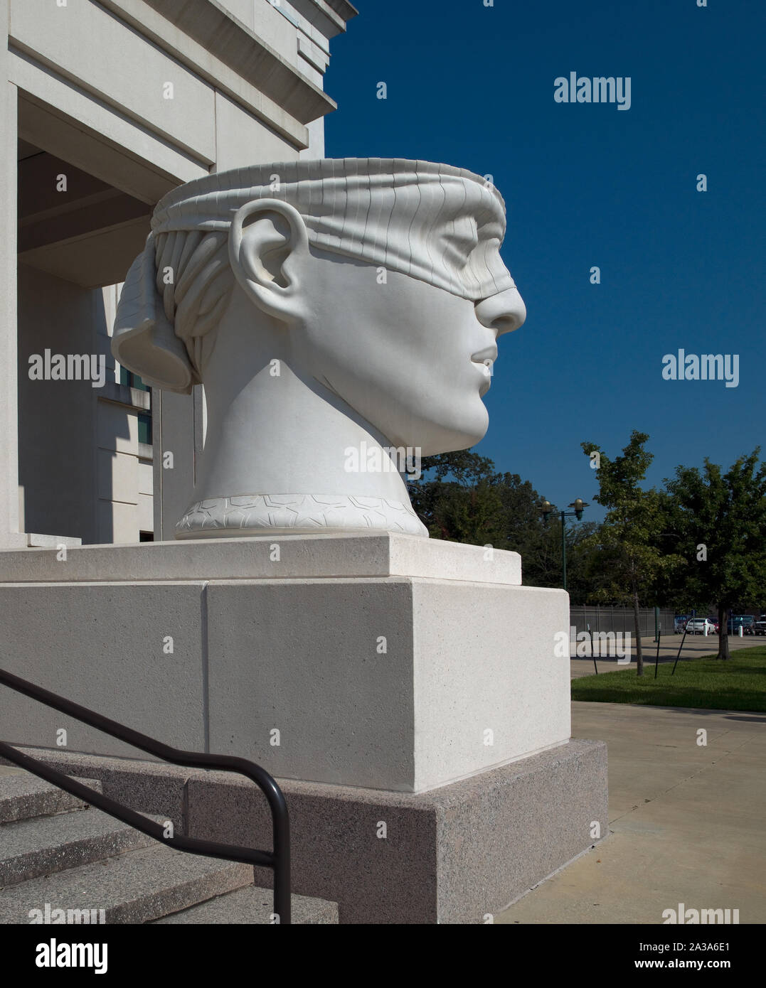 Sculpture Urns of Justice at exterior entrance plinith of the John M ...