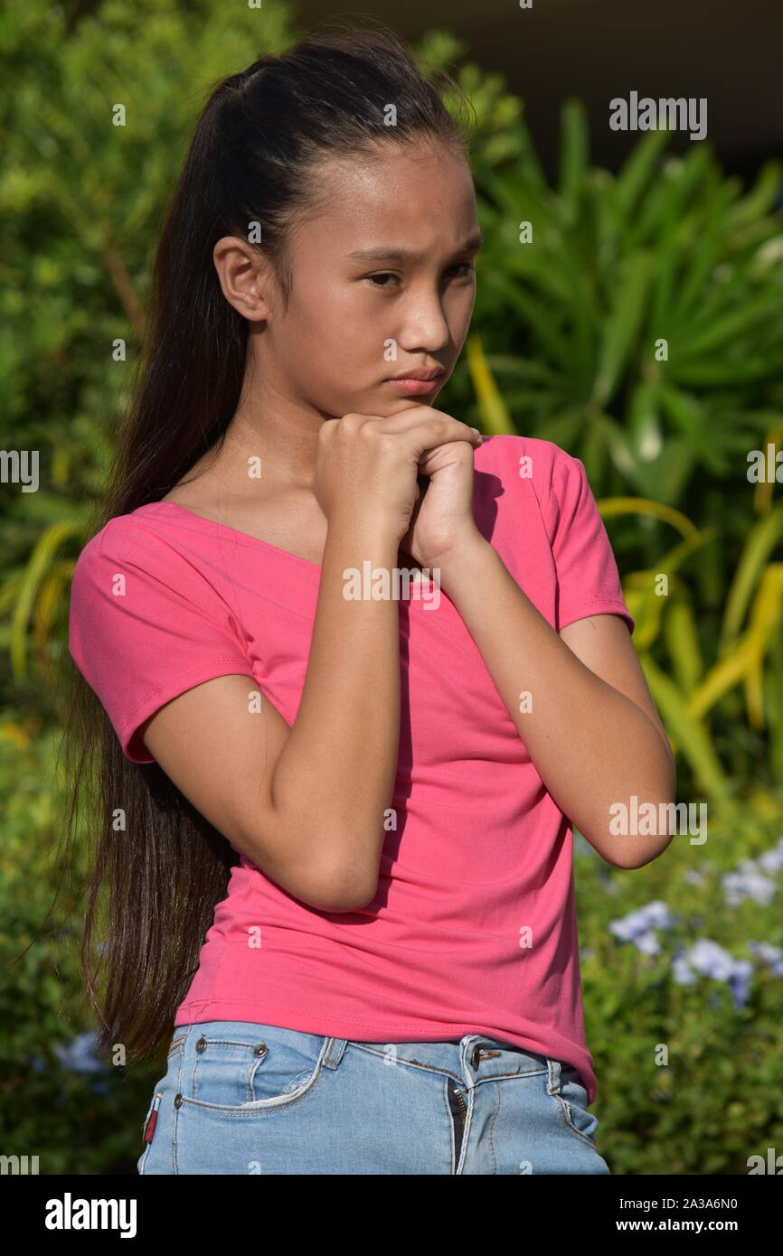 An A Teenager Girl Thinking Stock Photo - Alamy