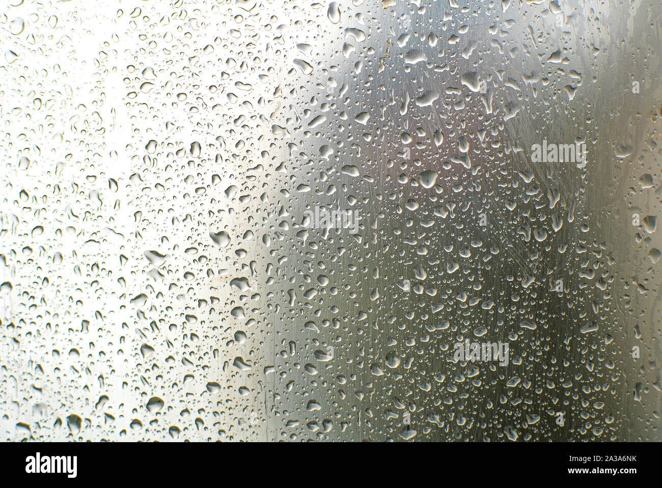 Shiny, metallic background, covered with water drops. Texture of water ...