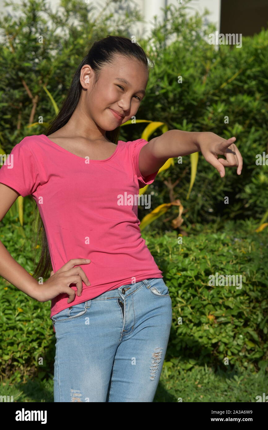 A Pointing Pretty Minority Female Stock Photo - Alamy