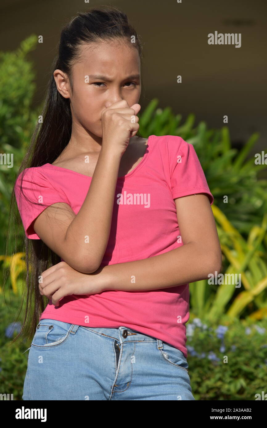 A Youthful Filipina Teen Girl Coughing Stock Photo - Alamy
