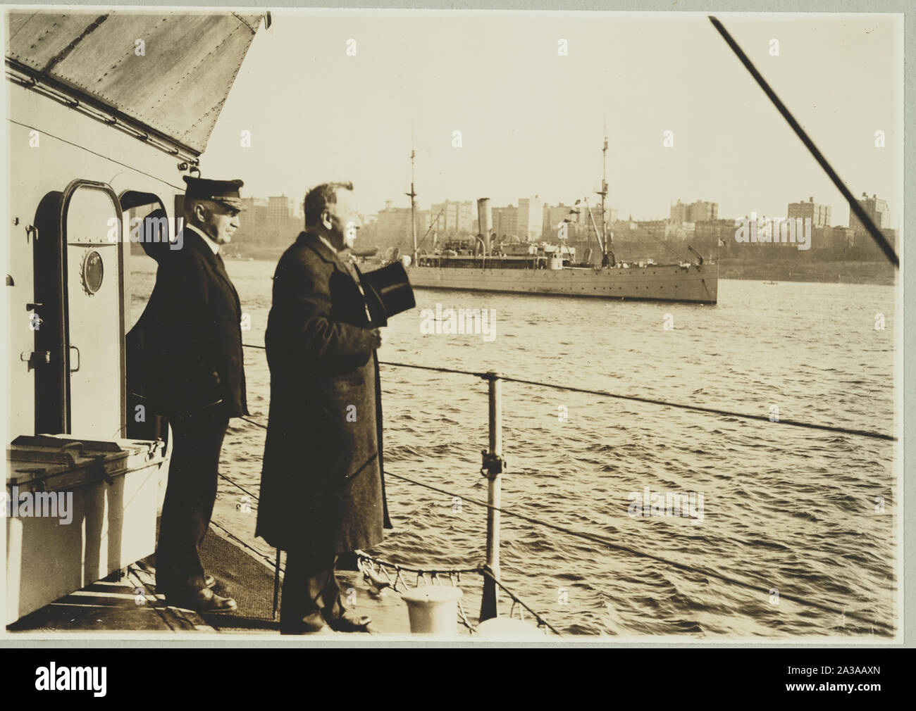 Secretary of the Navy, Josephus Daniels standing on the deck of a ship ...