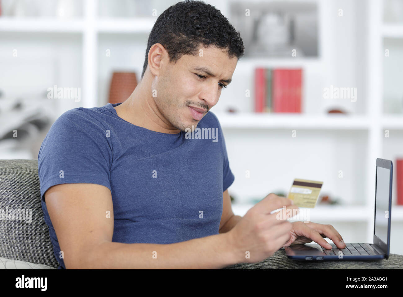 Young businessman doing online payment hi-res stock photography and ...