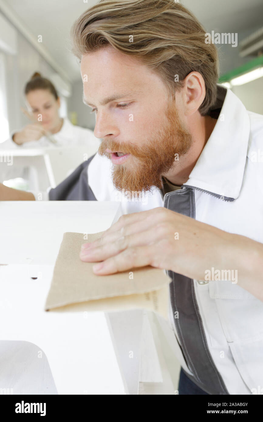 Workman sanding hi-res stock photography and images - Alamy