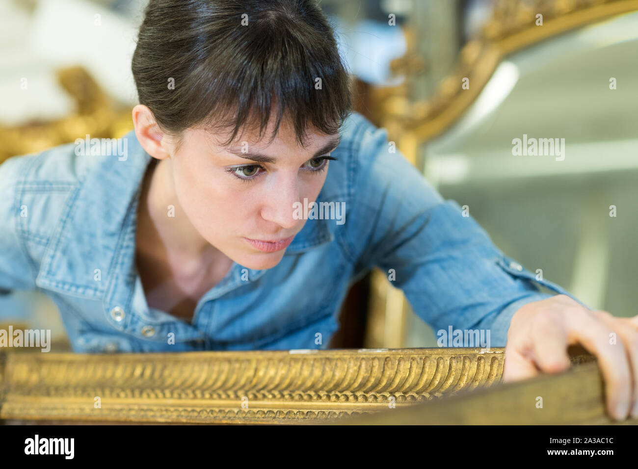 Inspecting artwork hi-res stock photography and images - Alamy