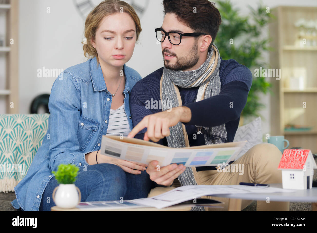 couple contradicting on the color Stock Photo - Alamy