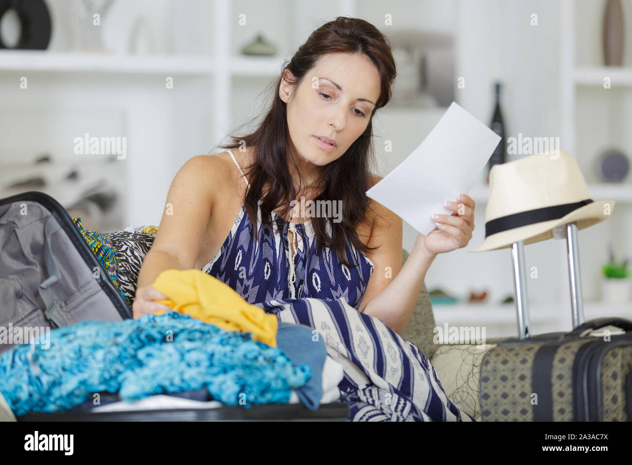 Female packing checklist hi-res stock photography and images - Alamy