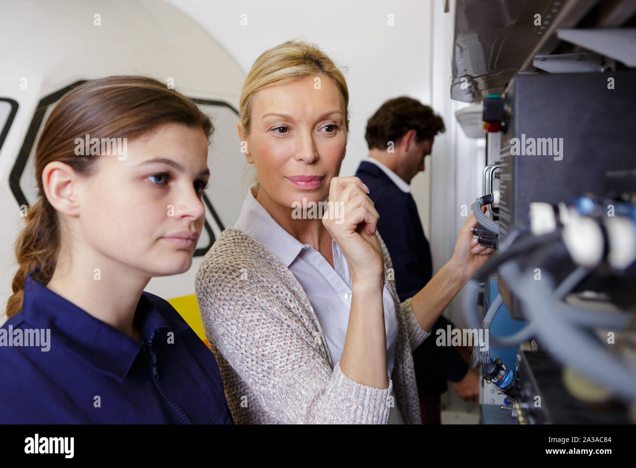Female pilot operating aircraft hi-res stock photography and images - Alamy