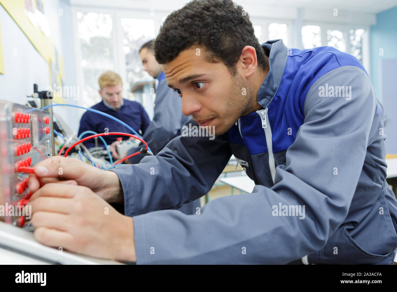 cables and machines at work Stock Photo - Alamy