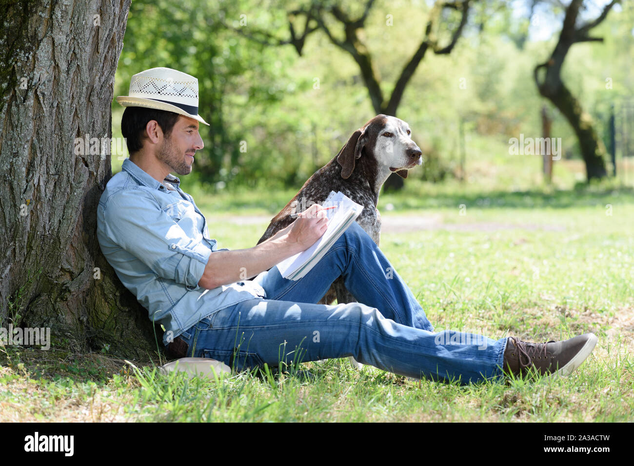 portrait of man with a dog Stock Photo - Alamy