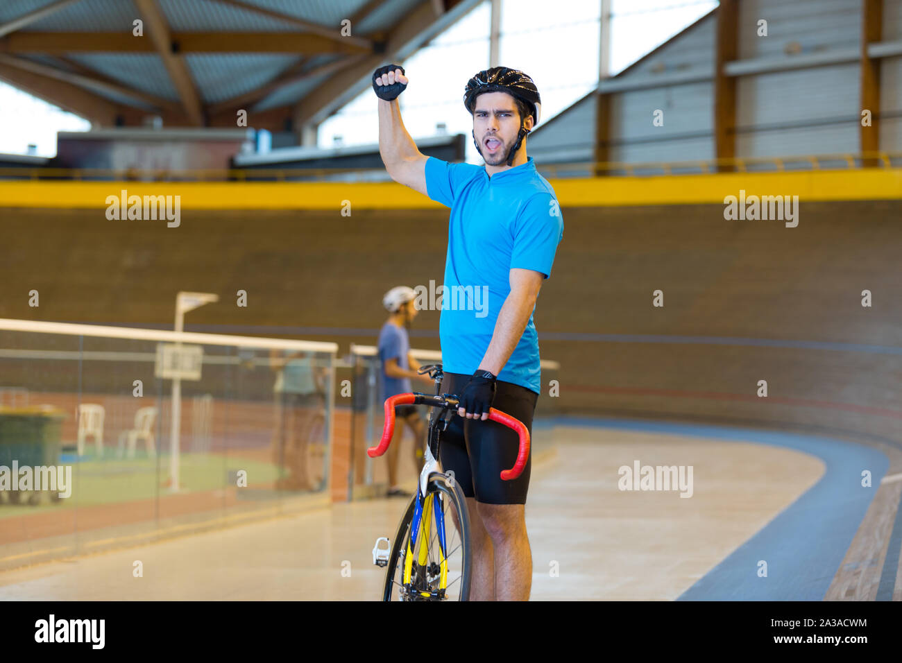 Man standing pose with cycle hi-res stock photography and images - Alamy