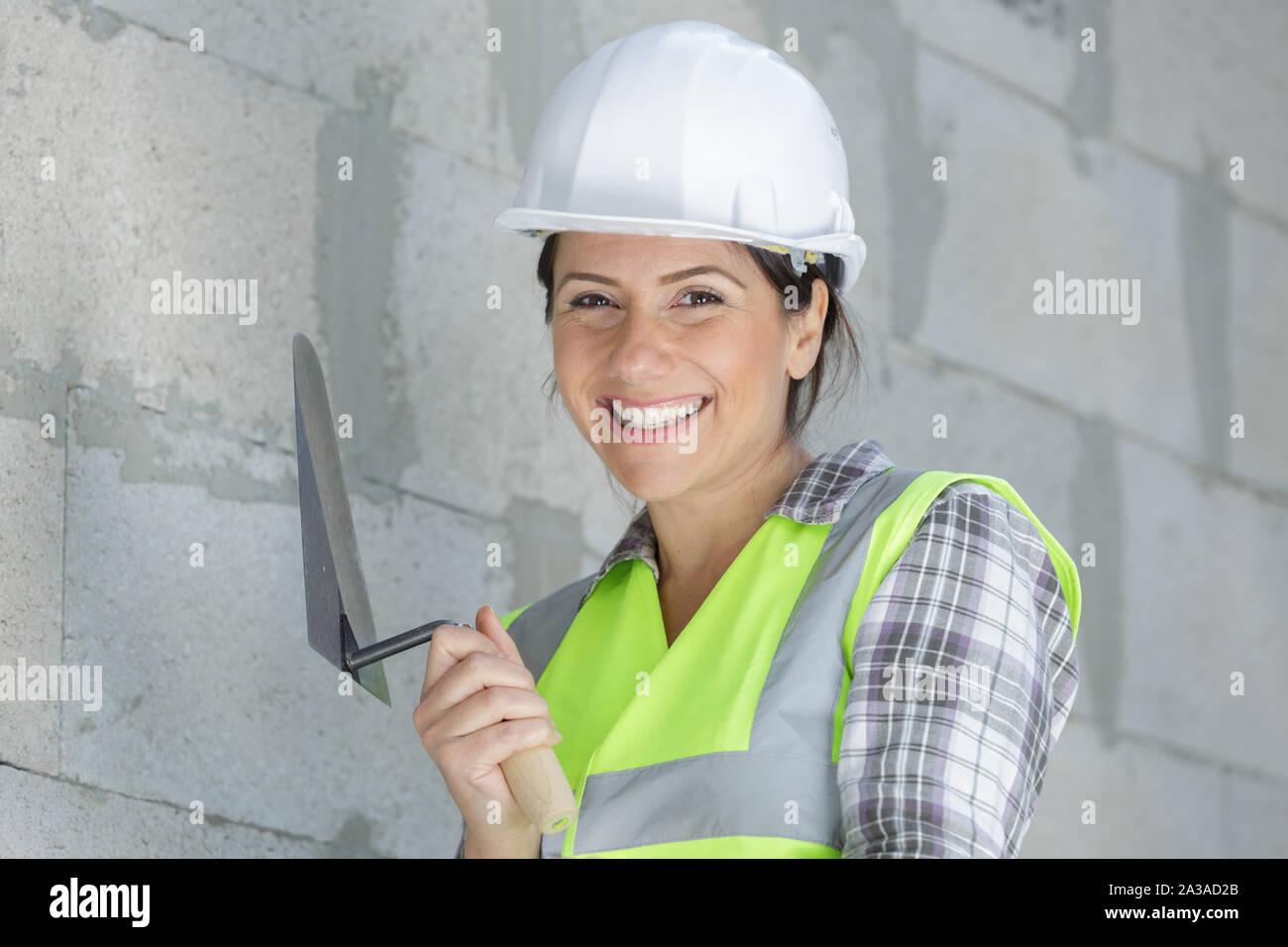 Happy young builder measuring hi-res stock photography and images - Alamy