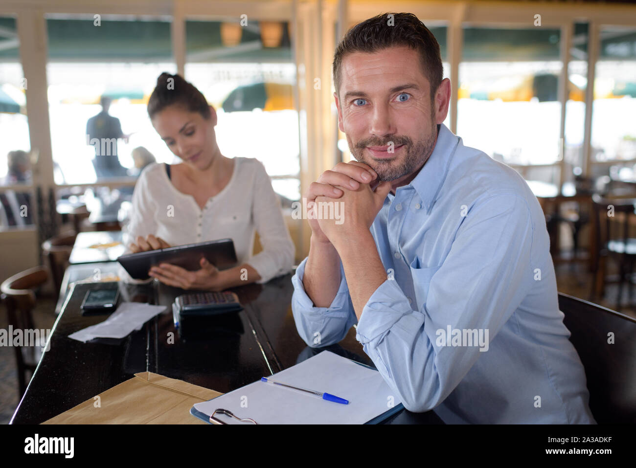 Man sat in cafe hi-res stock photography and images - Alamy