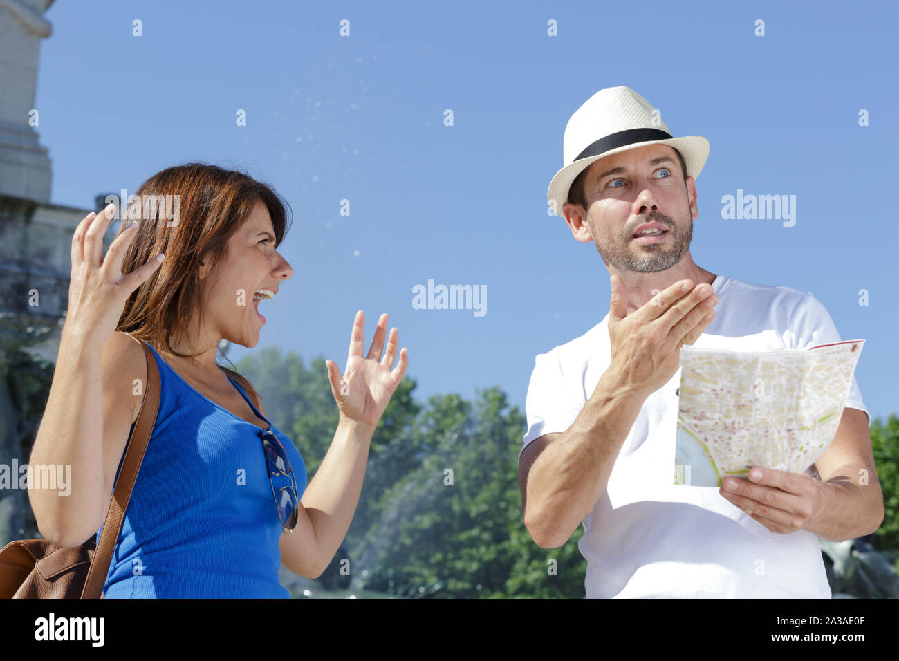 Couple shouting map hi-res stock photography and images - Alamy
