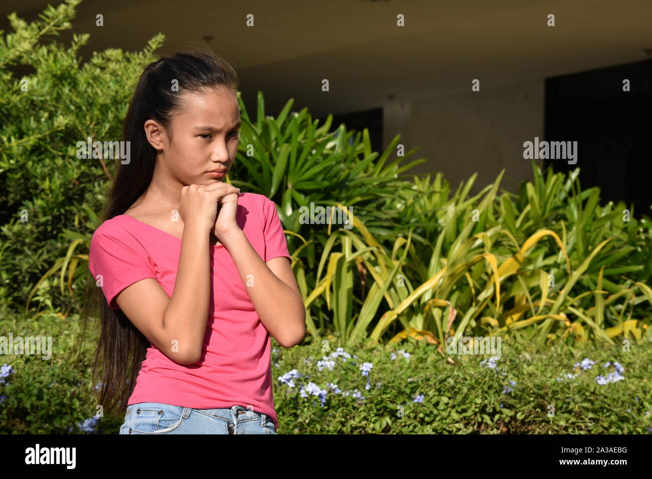 A Teen Girl Thinking Stock Photo - Alamy