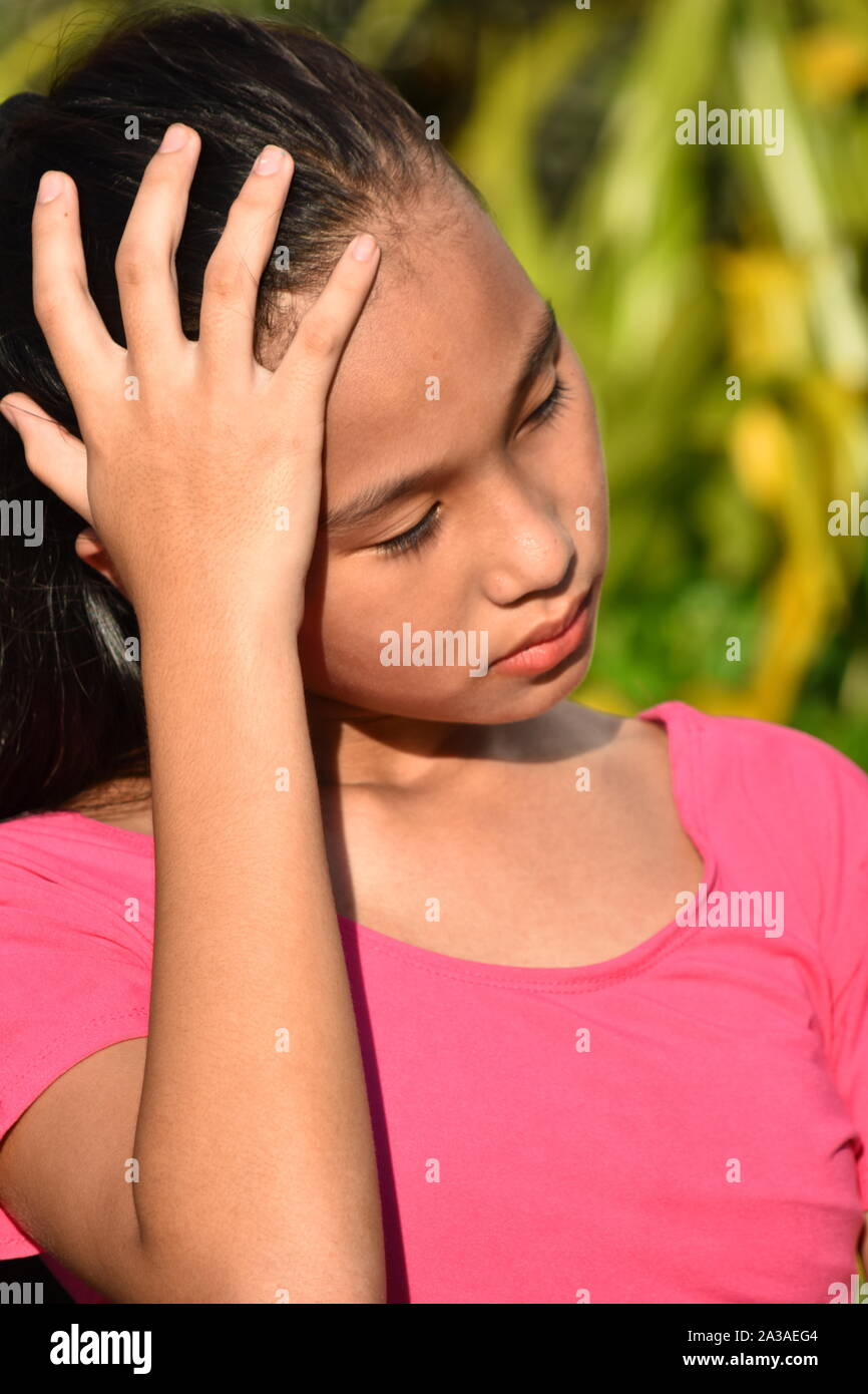 An A Forgetful Teenager Girl Stock Photo - Alamy