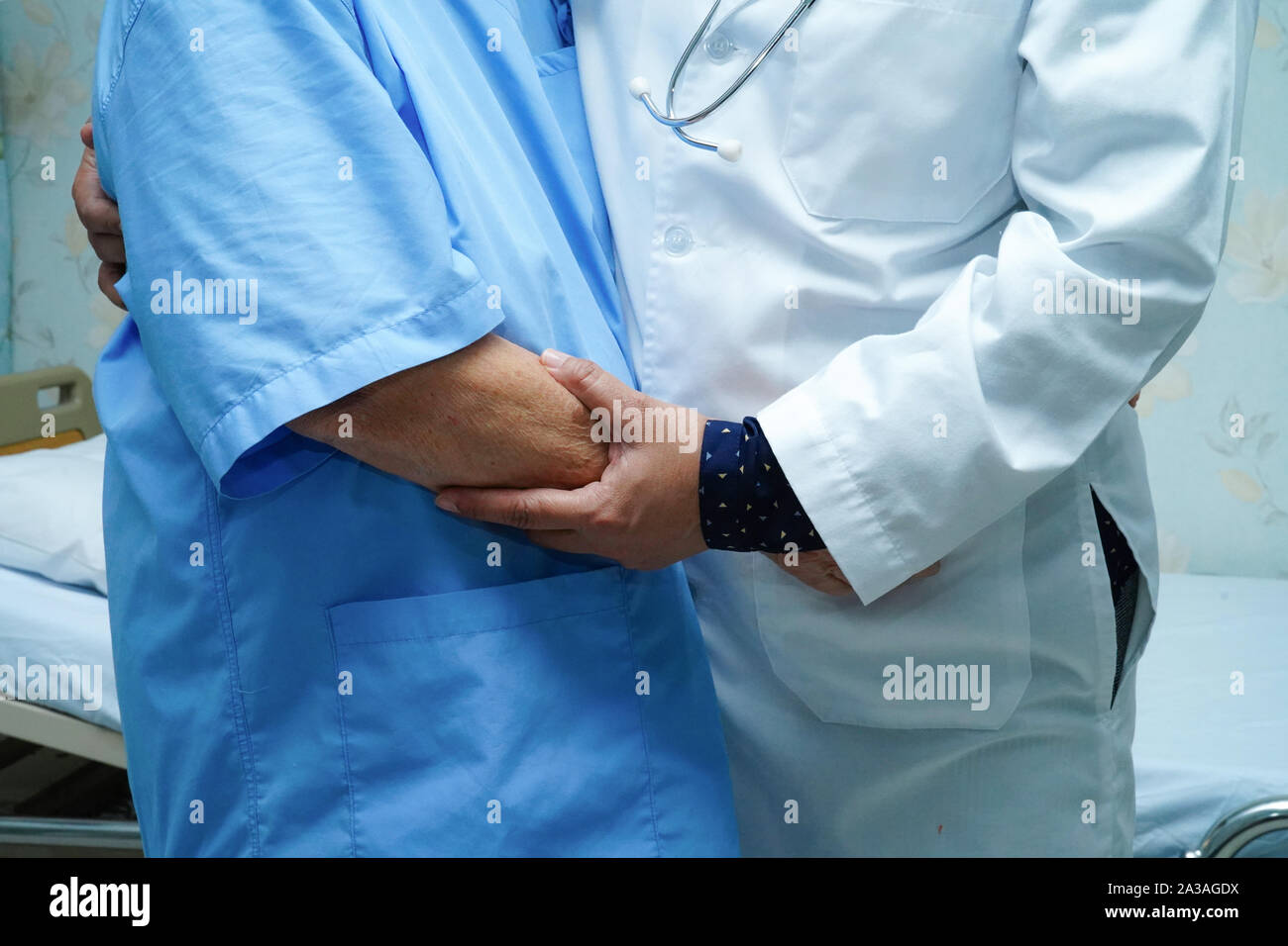 Doctor hug with patient with love, care, helping, encourage and empathy ...