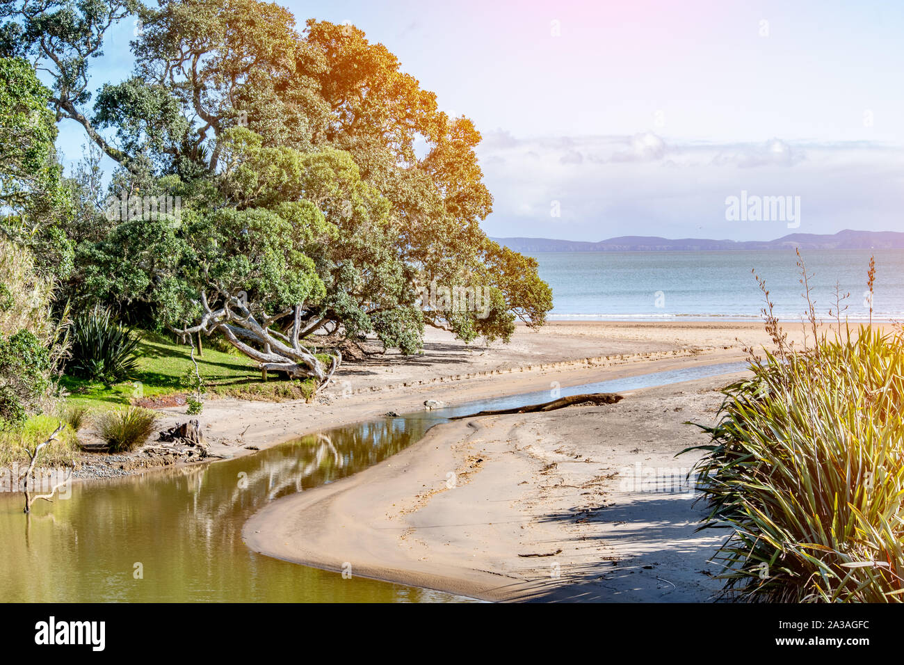 A beautiful photo of a river mouth flowing into the sea Stock Photo - Alamy