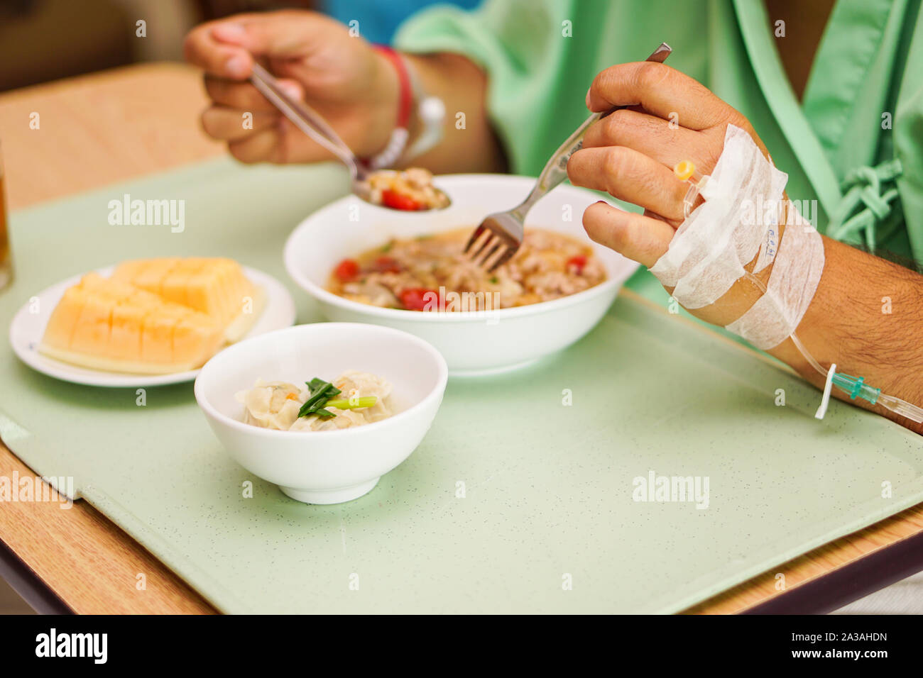 Asian lady woman patient eating breakfast healthy food with hope and ...