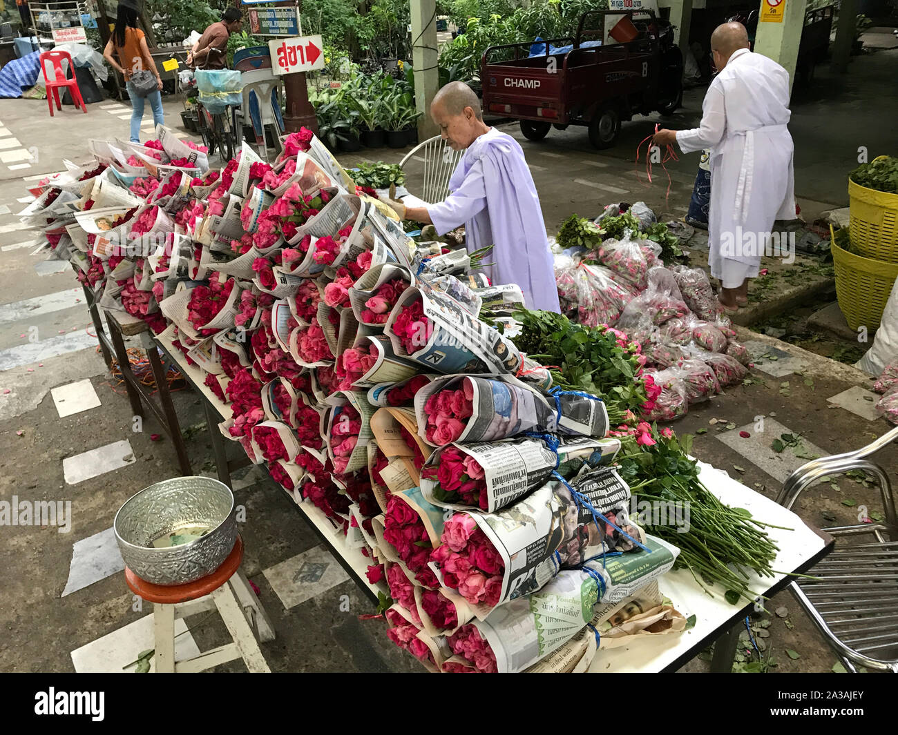 NOTHABURI, THAILAND, SEP 16 2019, A female Buddhist monk sells a ...