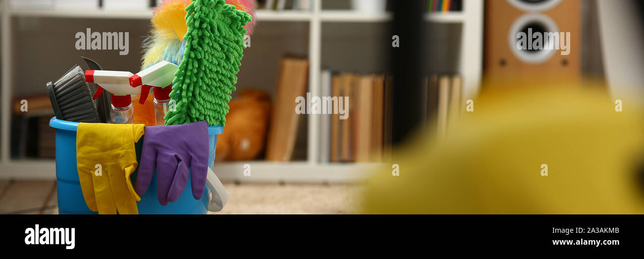 A bucket with cleaning equipment stands Stock Photo - Alamy