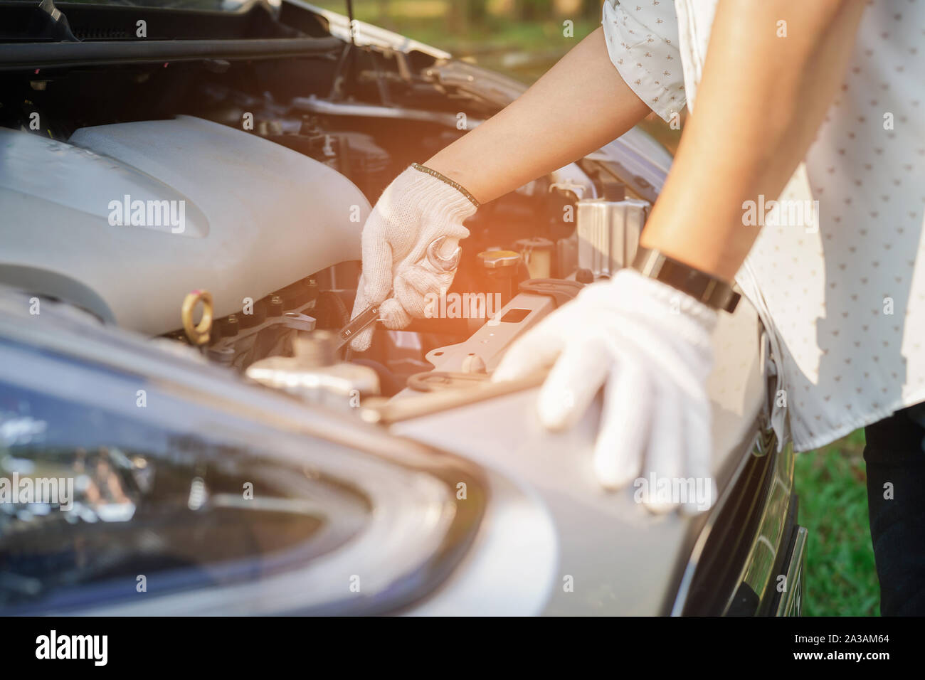 Open hood mechanic engine system to check and repair damage car crash ...