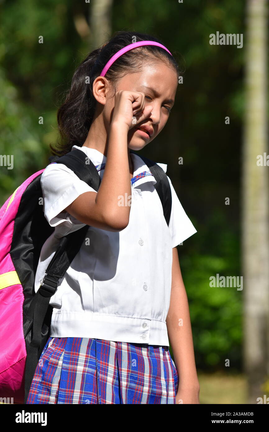 A Crying Female Student With Notebooks Stock Photo - Alamy