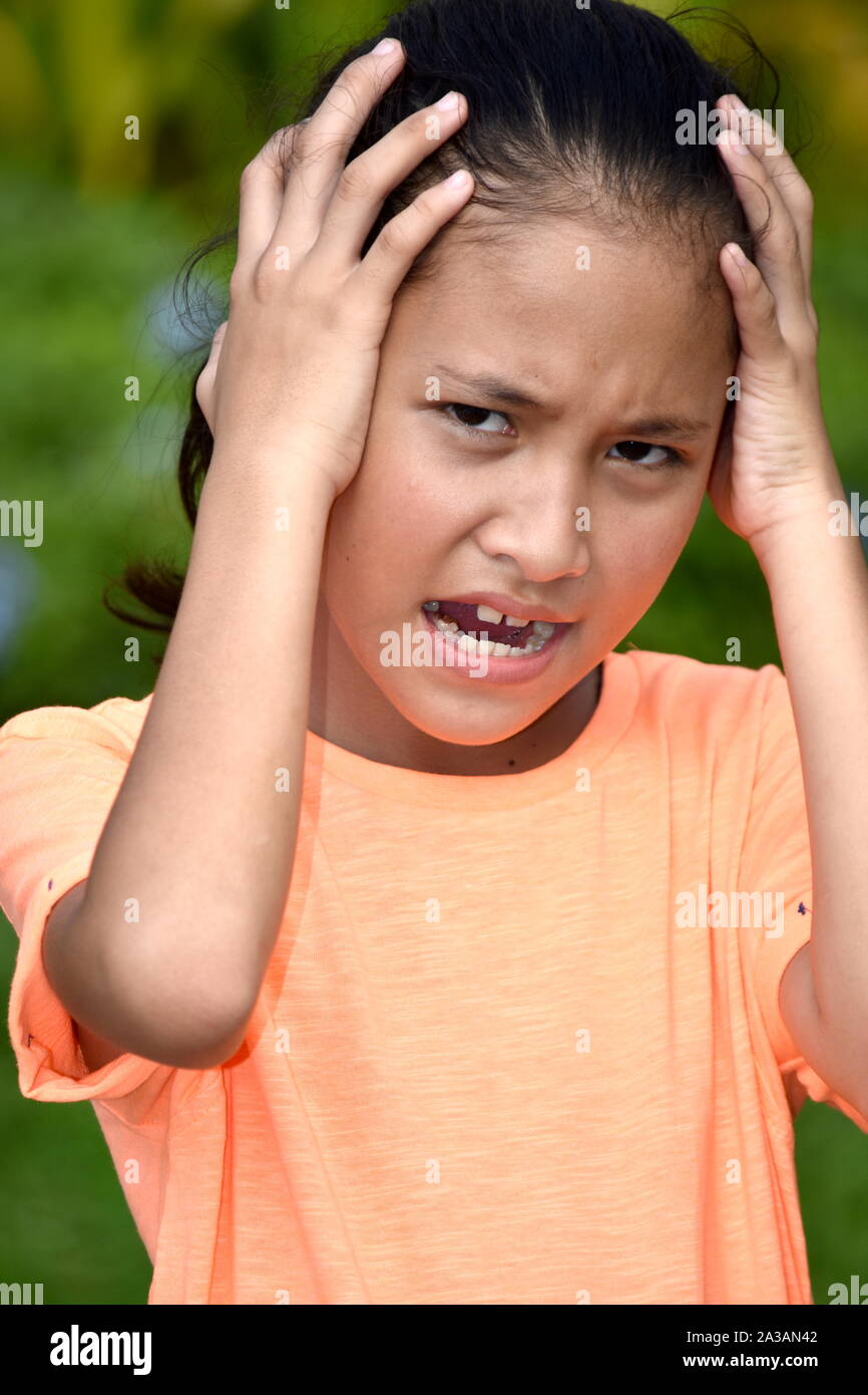 An A Stressed Filipina Female Stock Photo - Alamy