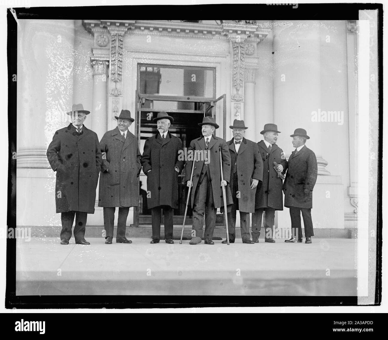 Group of seven people standing Black and White Stock Photos & Images ...