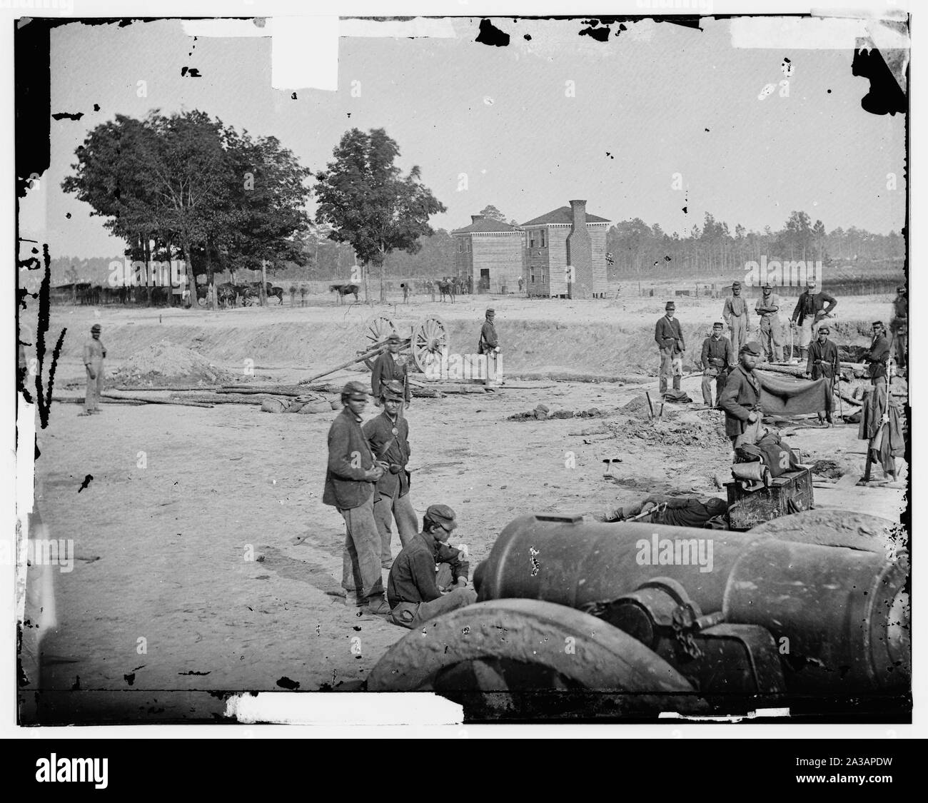 Seven Pines, Va. Twin houses on battlefield, with 32-pdr. field ...