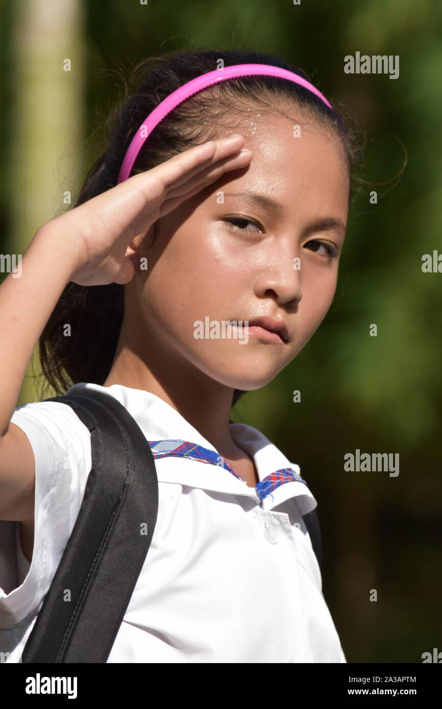 An A Female Student Saluting Stock Photo - Alamy