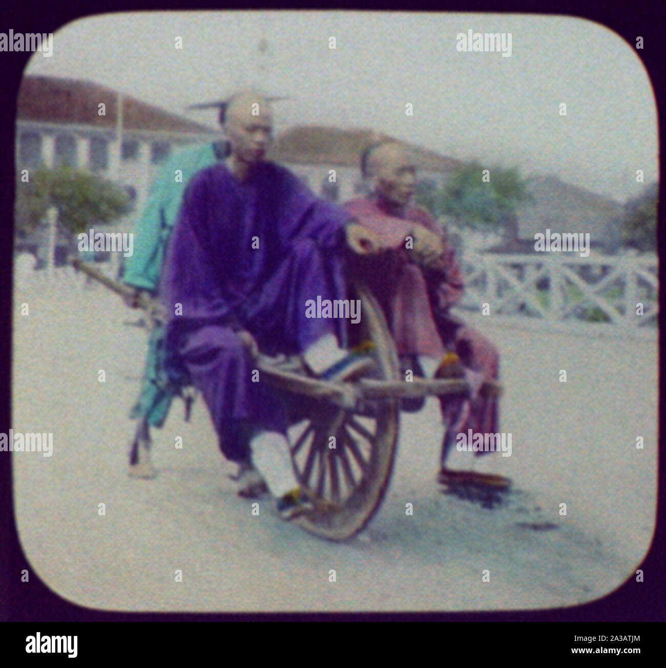 Shanghai - two Chinese men being carried in wheelbarrow Stock Photo - Alamy