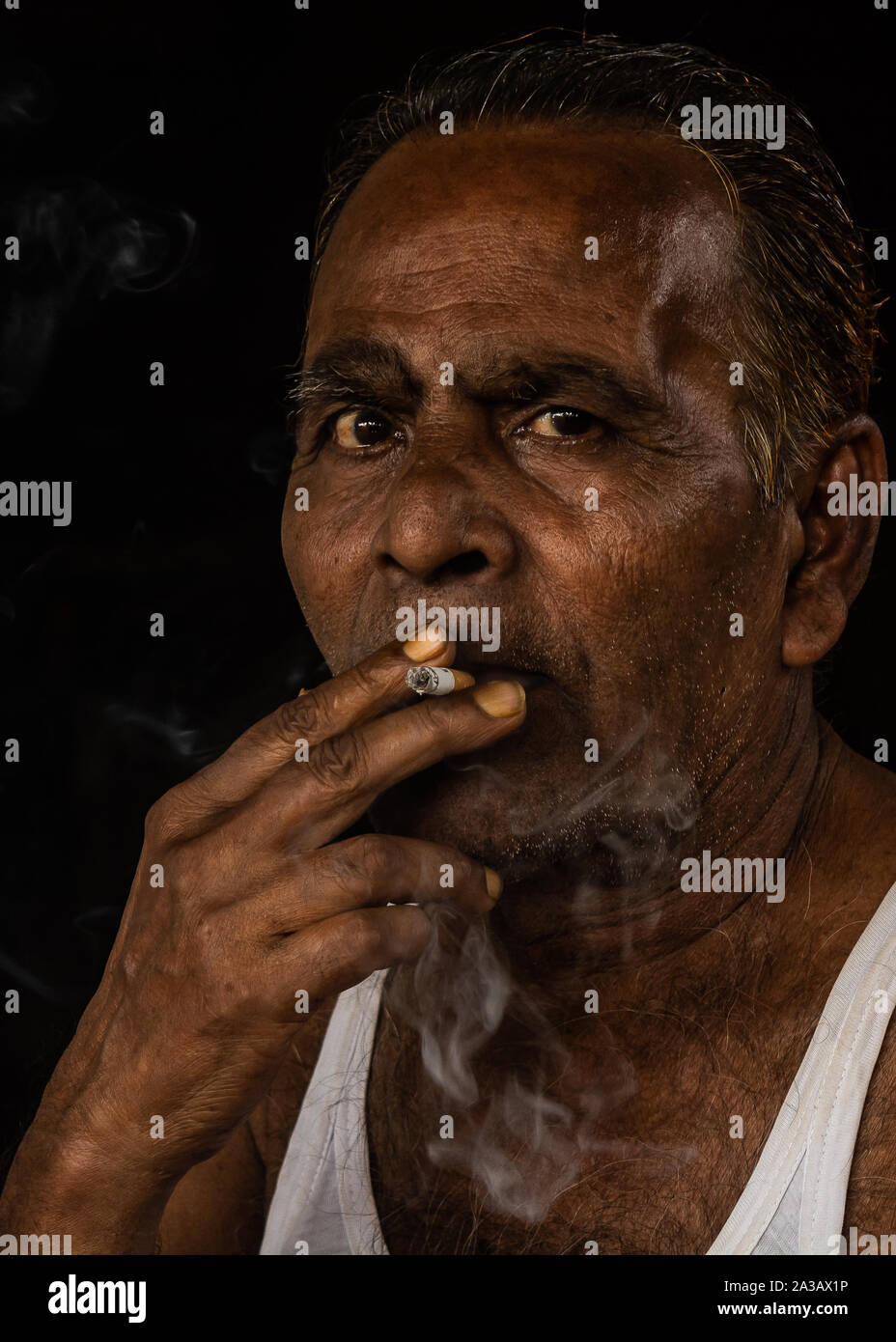 Smoking old man living unhealthy life in Bangladesh, Asia Stock Photo ...