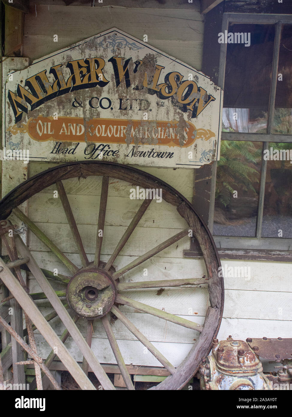 Wagon Wheel And Miller Wilson Sign In A Historic Village Stock Photo ...