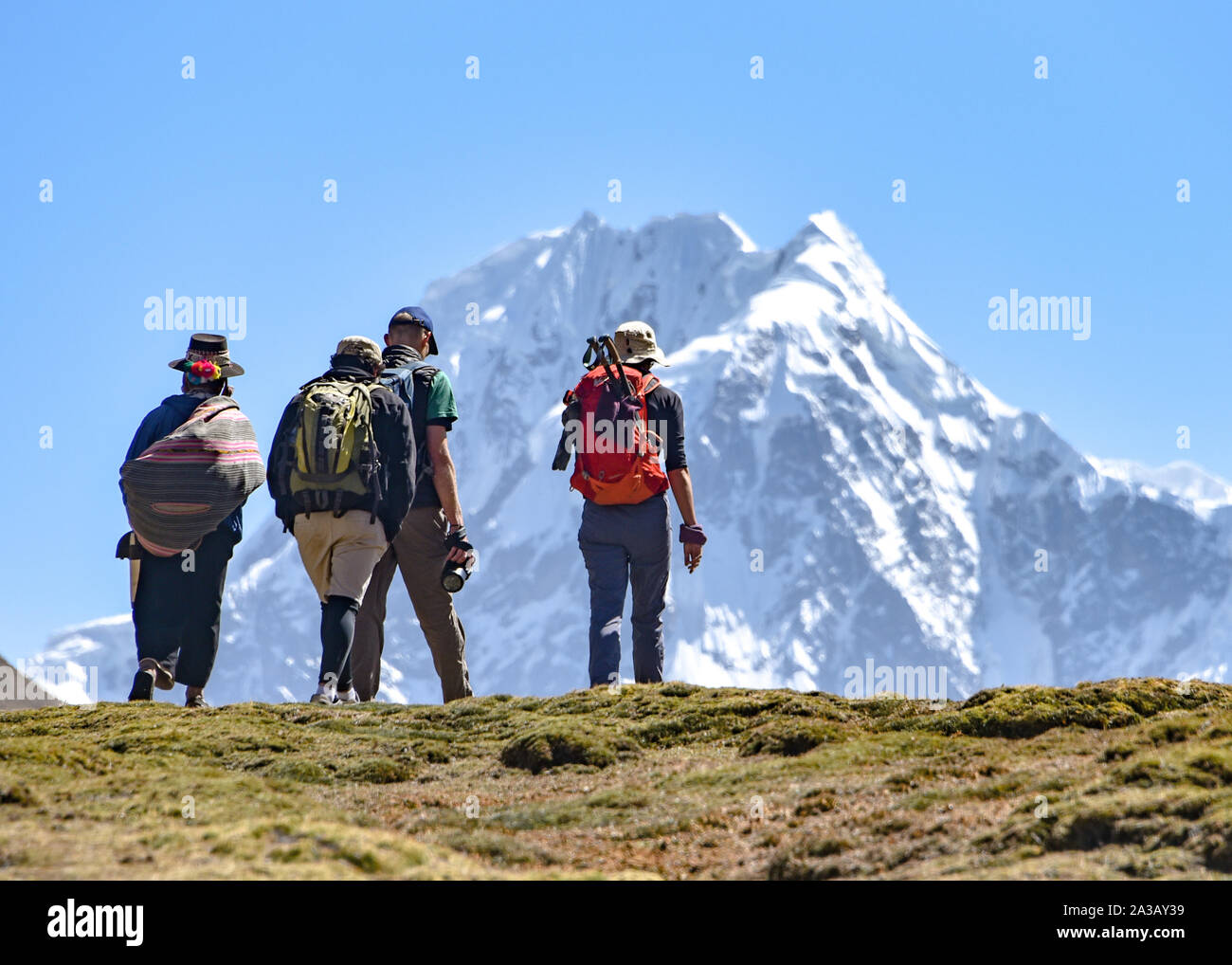 Group trekkers hiking on mountain hi-res stock photography and images ...
