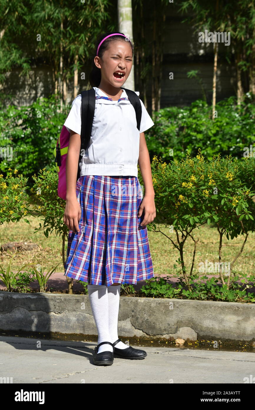 A Girl Student Shouting With Notebooks Stock Photo - Alamy