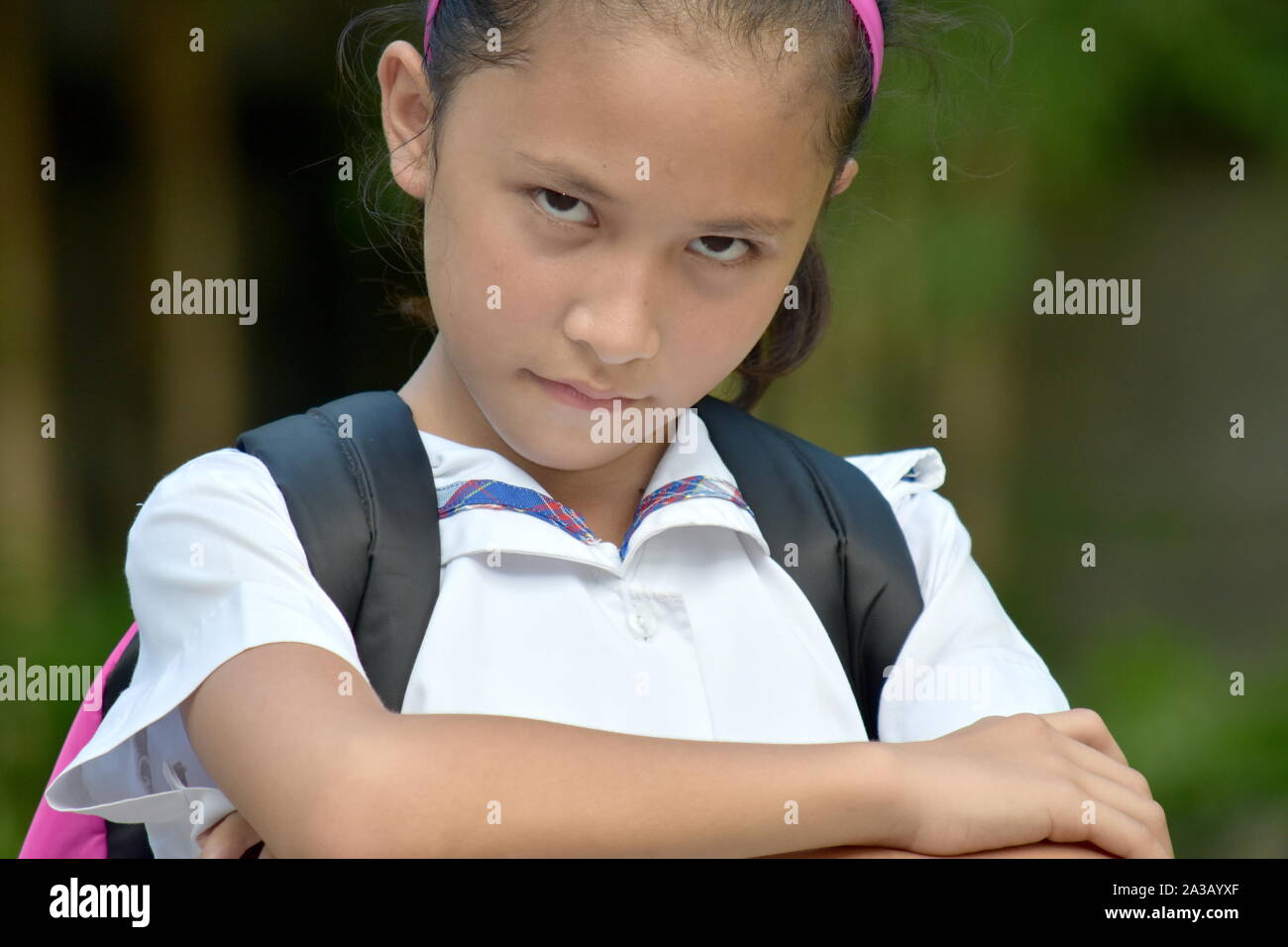 A Stubborn Female Student With Notebooks Stock Photo - Alamy